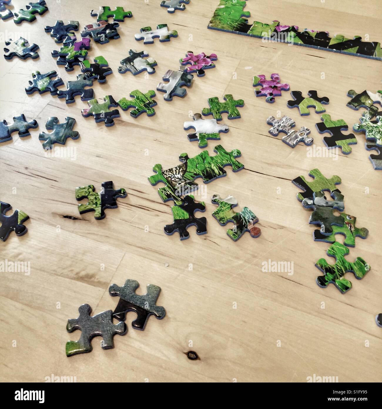 Jigsaw pieces fitting together hi-res stock photography and images - Alamy