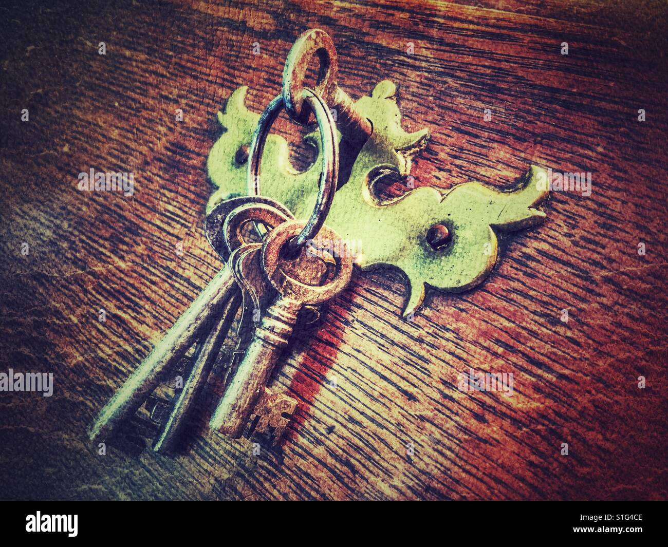 Antique lock and key in an antique oak bureau Stock Photo - Alamy