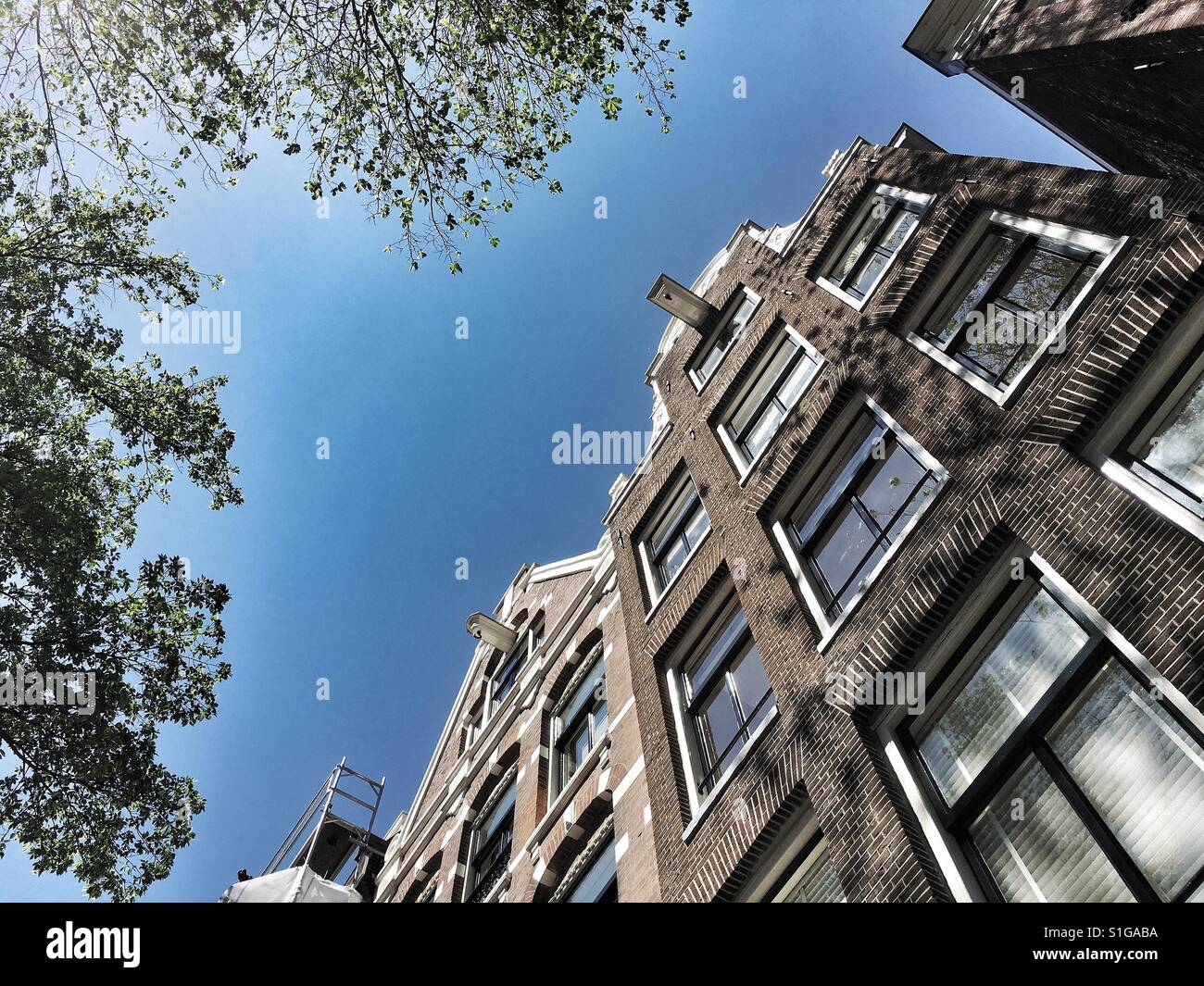 Dutch building rising Stock Photo - Alamy
