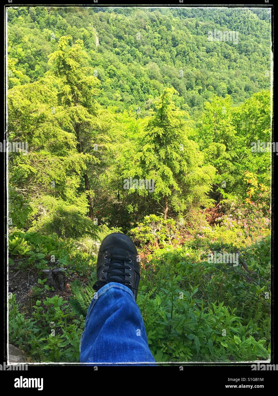 Shoe over edge of ledge hi-res stock photography and images - Alamy