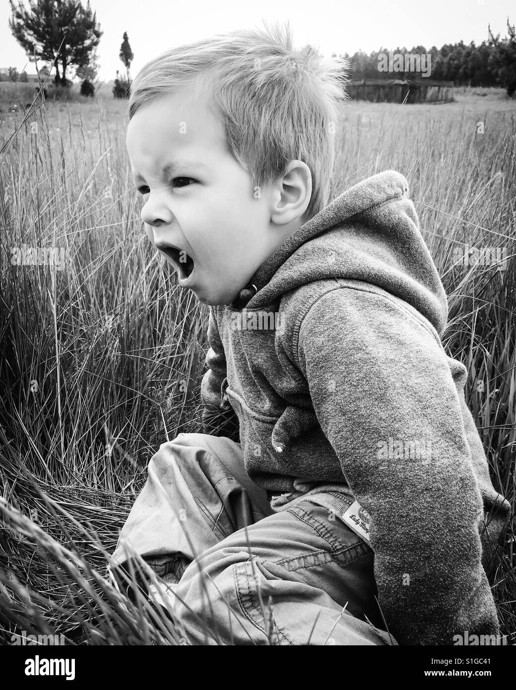 Yawning boy hi-res stock photography and images - Alamy