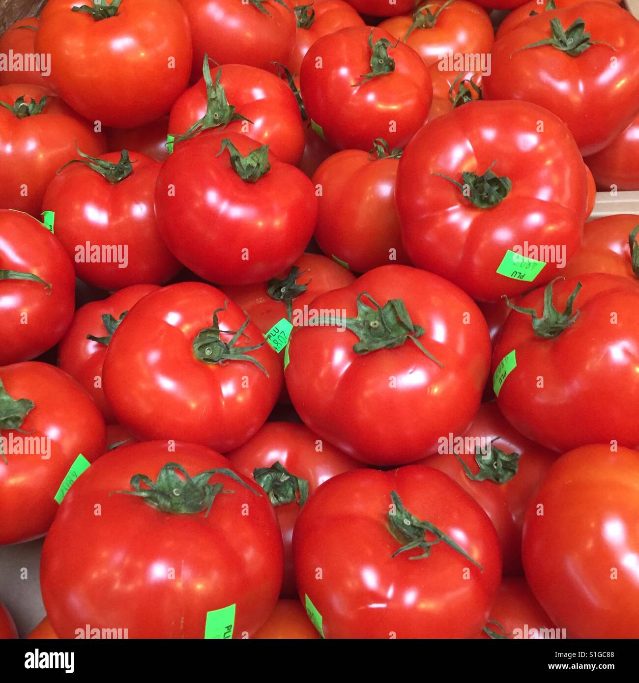 Shiny tomatoes hi-res stock photography and images - Alamy