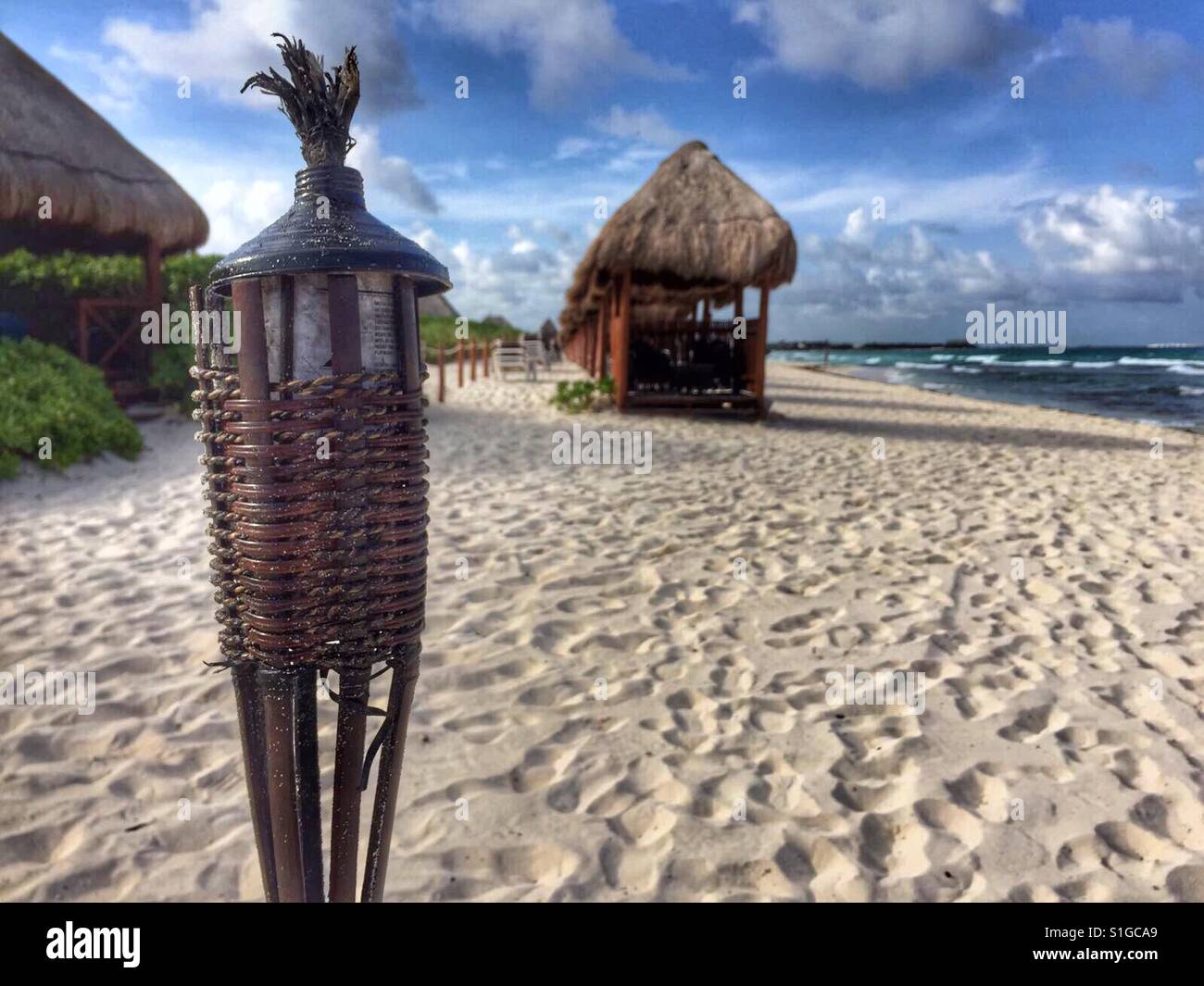 Tiki Torches On Beach