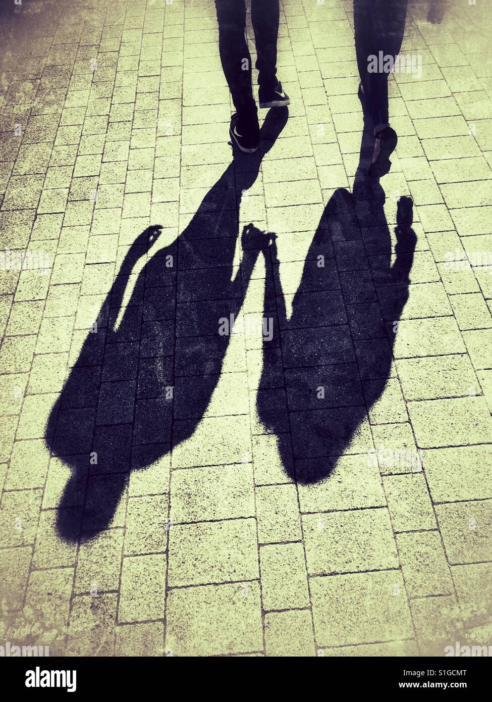 Walking shadow hi-res stock photography and images - Alamy