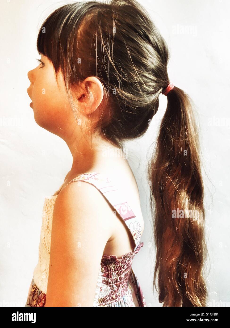 5 year old girl ponytail hi-res stock photography and images - Alamy