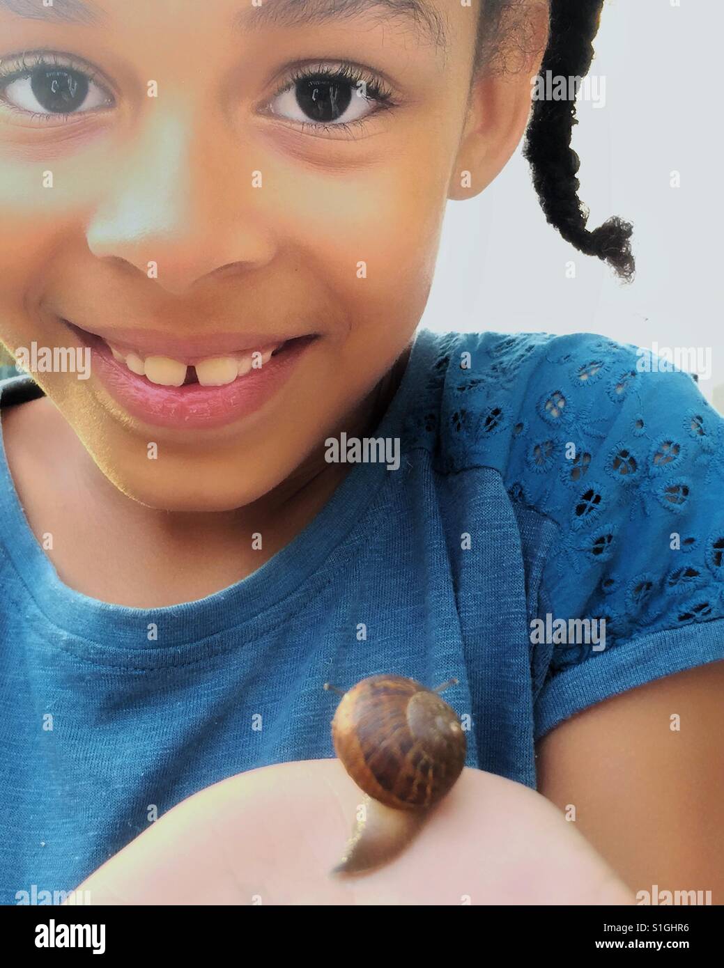 Girl snail hi-res stock photography and images - Alamy