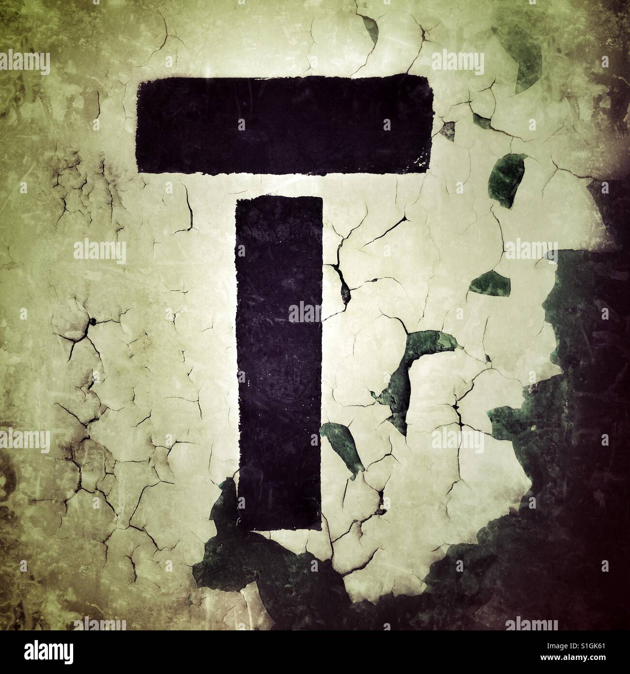 Letter T on distressed background Stock Photo - Alamy