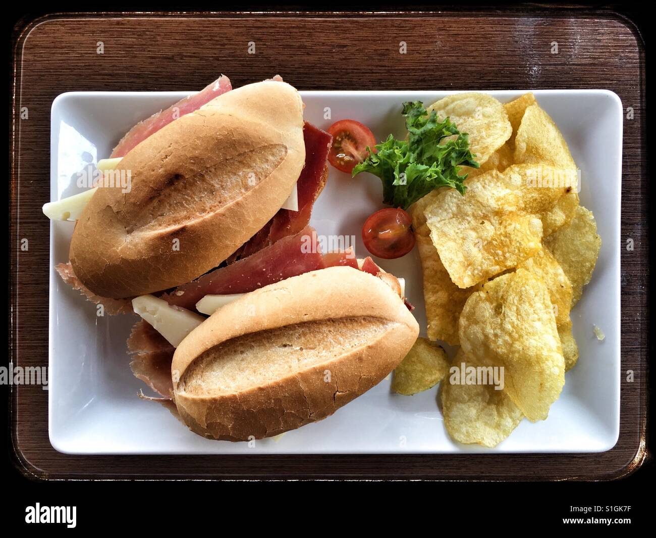 Ham and Cheese rolls with Crisps Stock Photo - Alamy