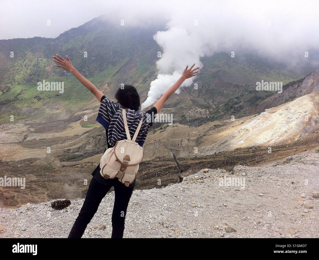 A woman say hello to Papandayan Crater in West Java Stock Photo - Alamy A woman say hello to Papandayan Crater in West Java Stock Photo - Alamy