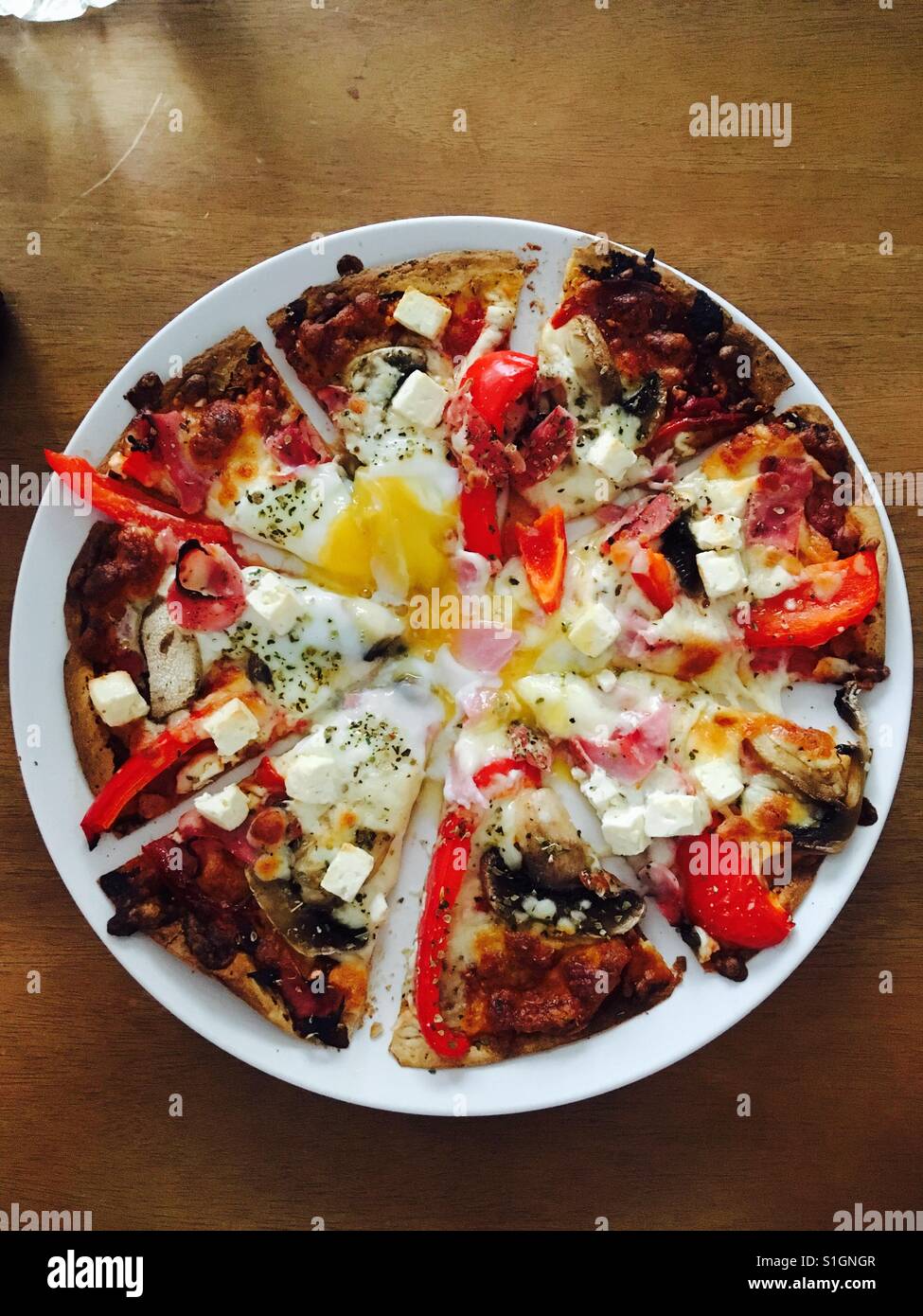 Quick tortilla pizza for tea Stock Photo - Alamy