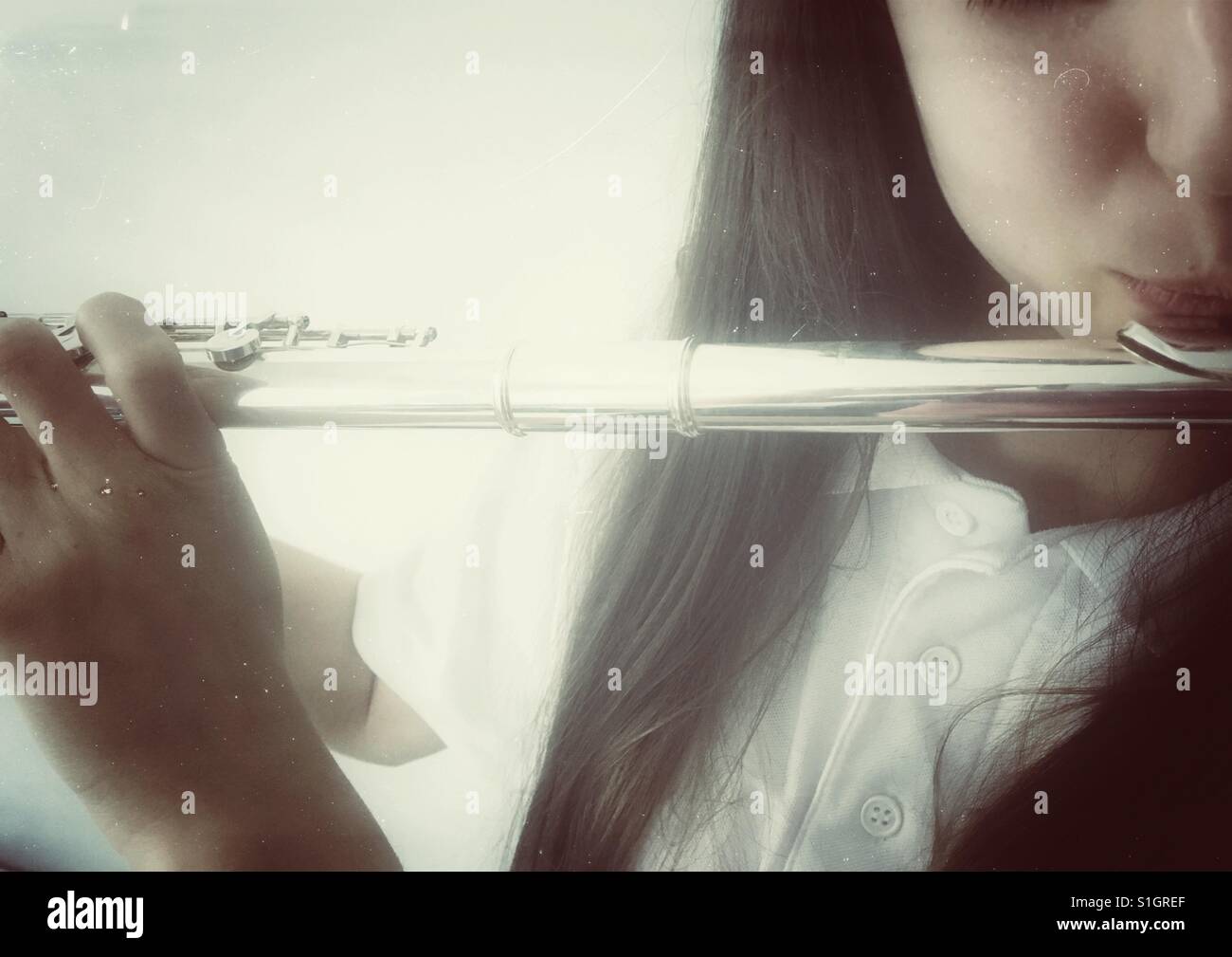 Female flautist hi-res stock photography and images - Alamy