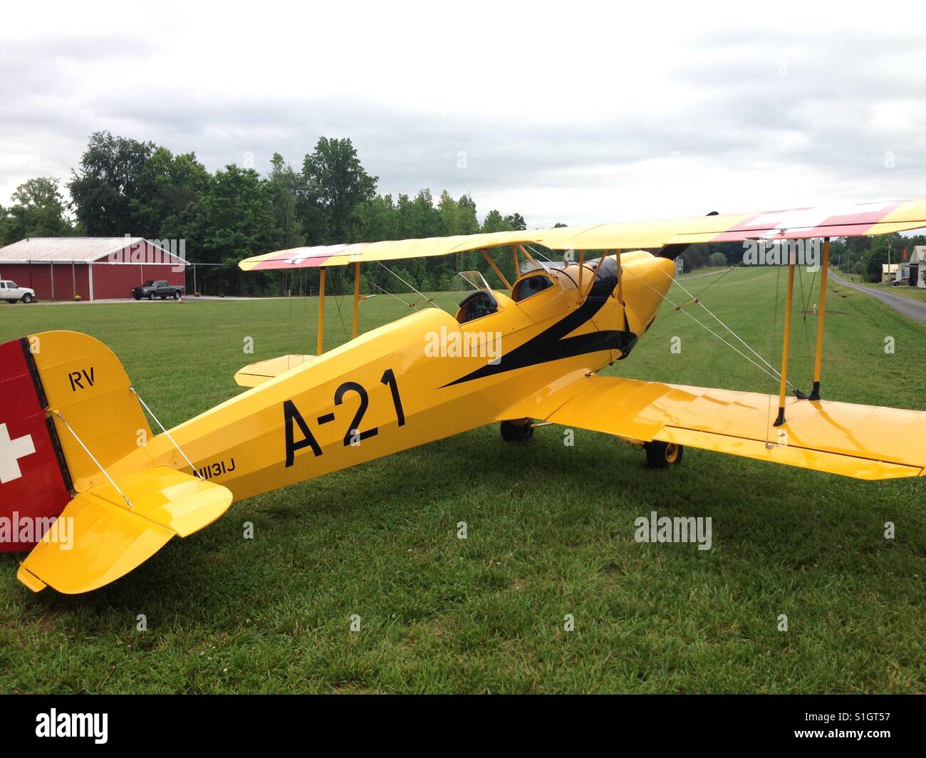 Yellow biplane hi-res stock photography and images - Alamy
