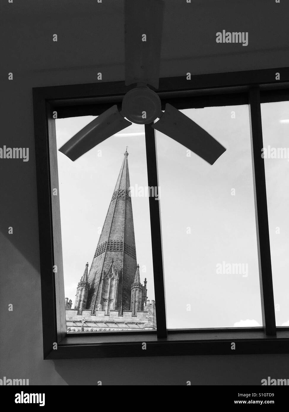 Chichester Cathedral Spire through a roof window Stock Photo - Alamy