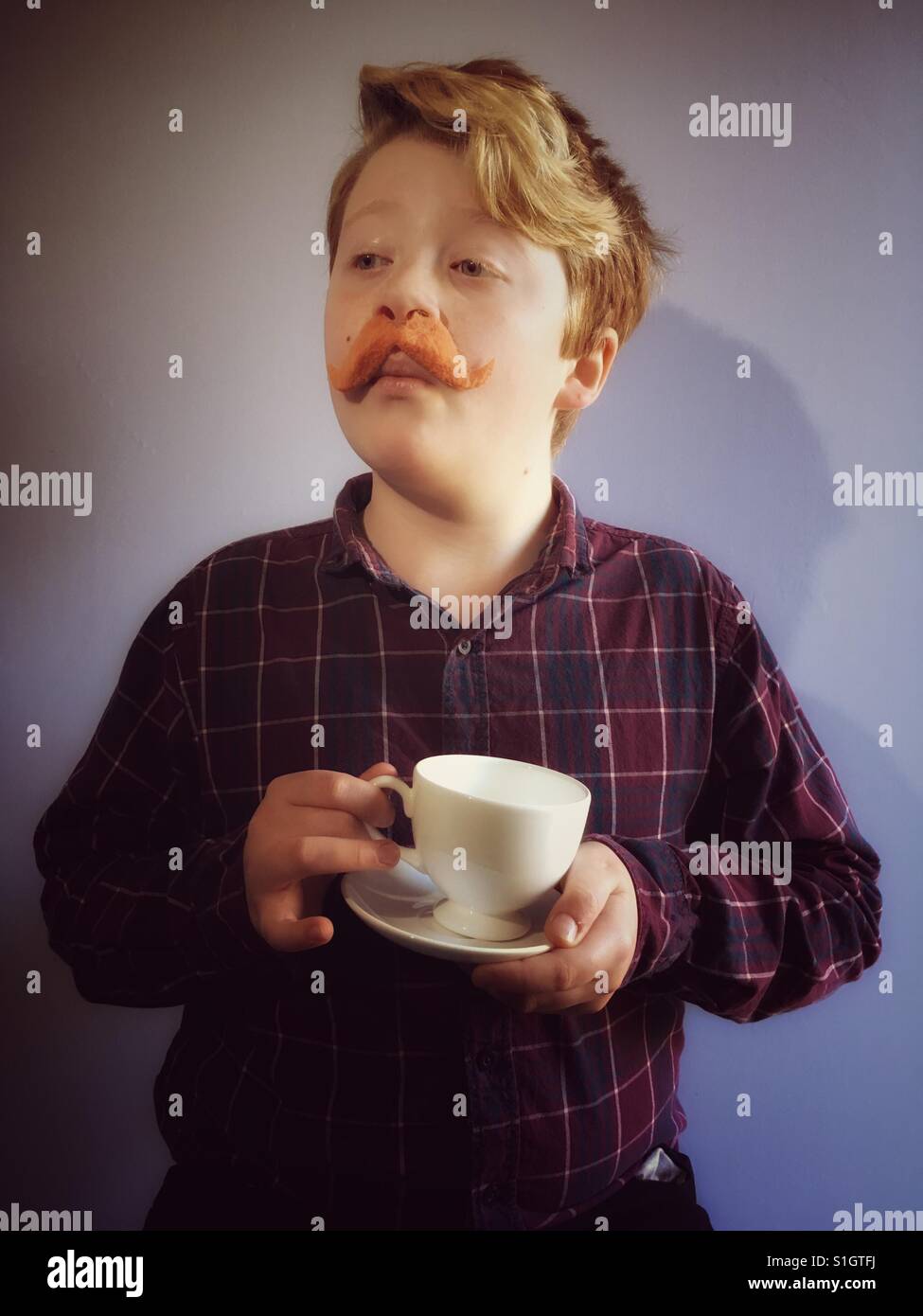 Child actor in rehearsals to play an elderly upper class man Stock ...
