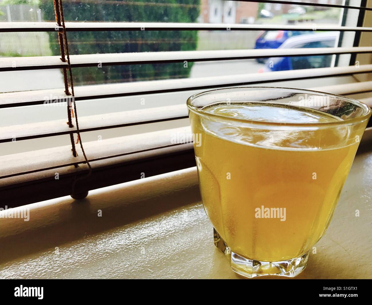 Drink in window Stock Photo - Alamy