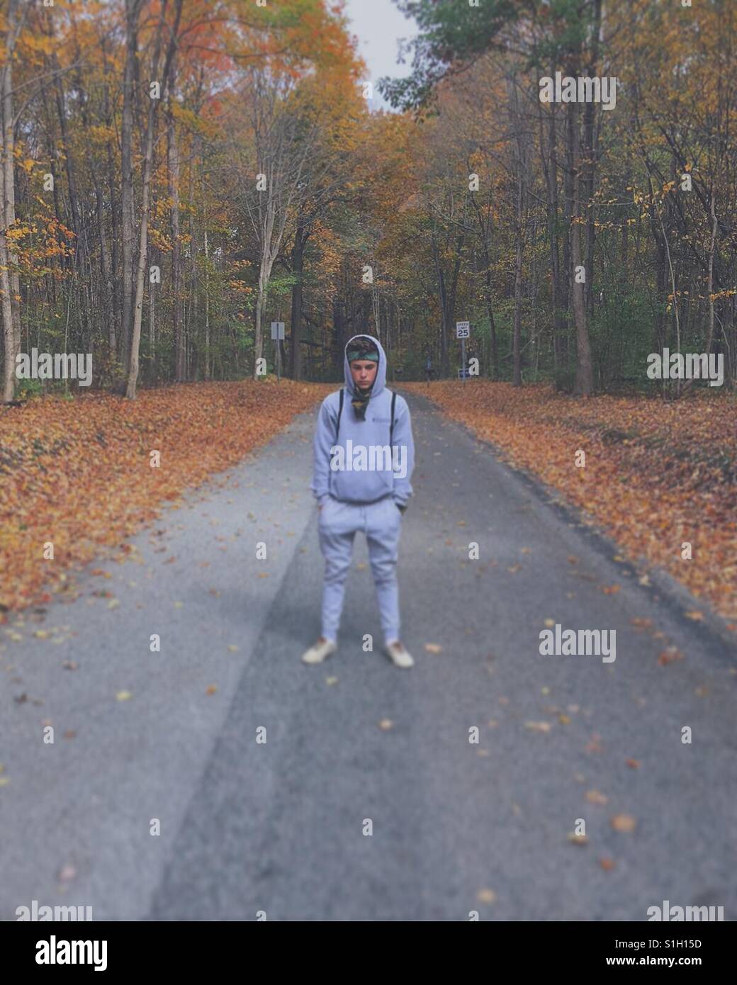 Autumn fall weather kid in groutfit Stock Photo - Alamy