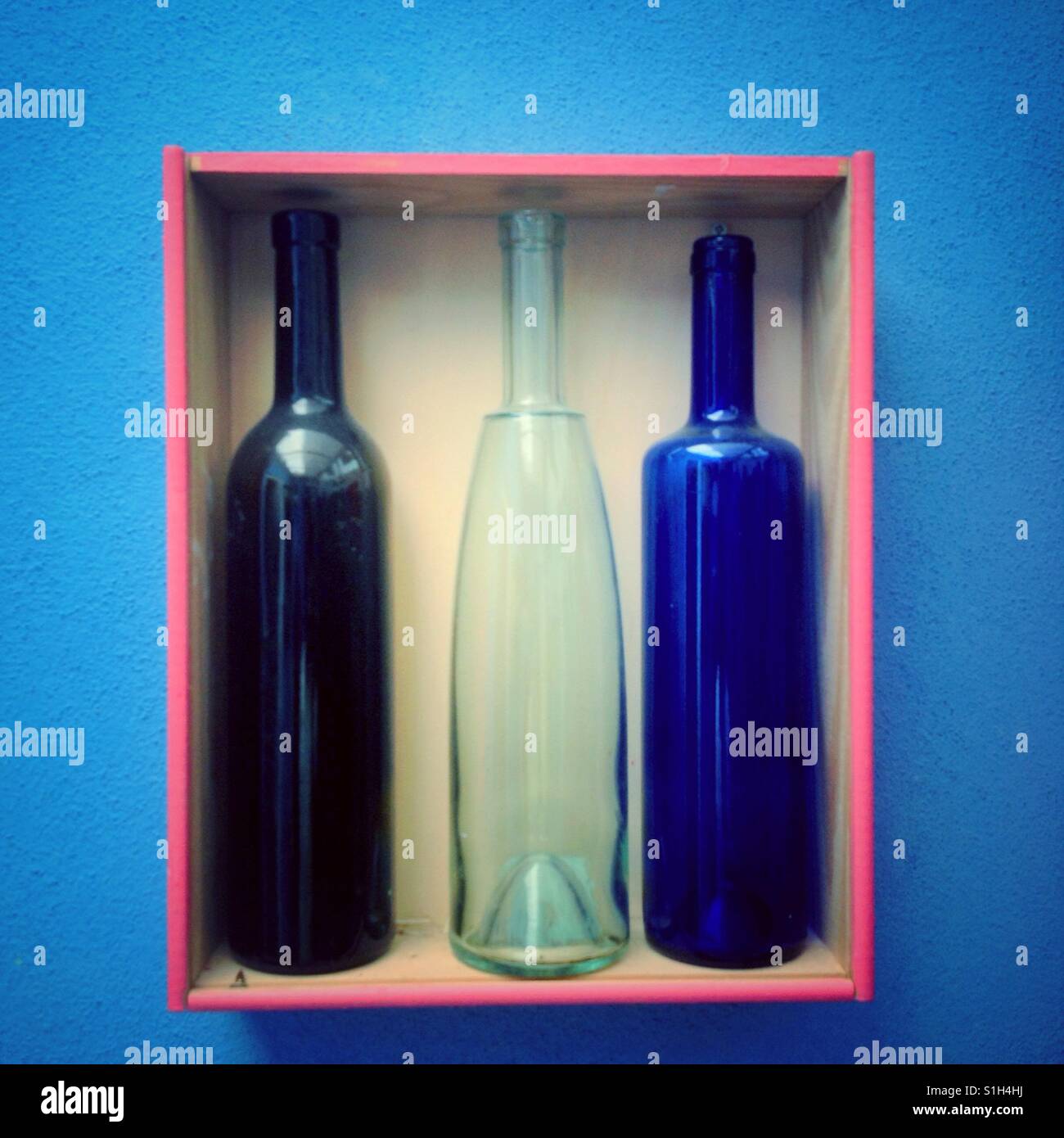 Blue wine bottles hi-res stock photography and images - Alamy