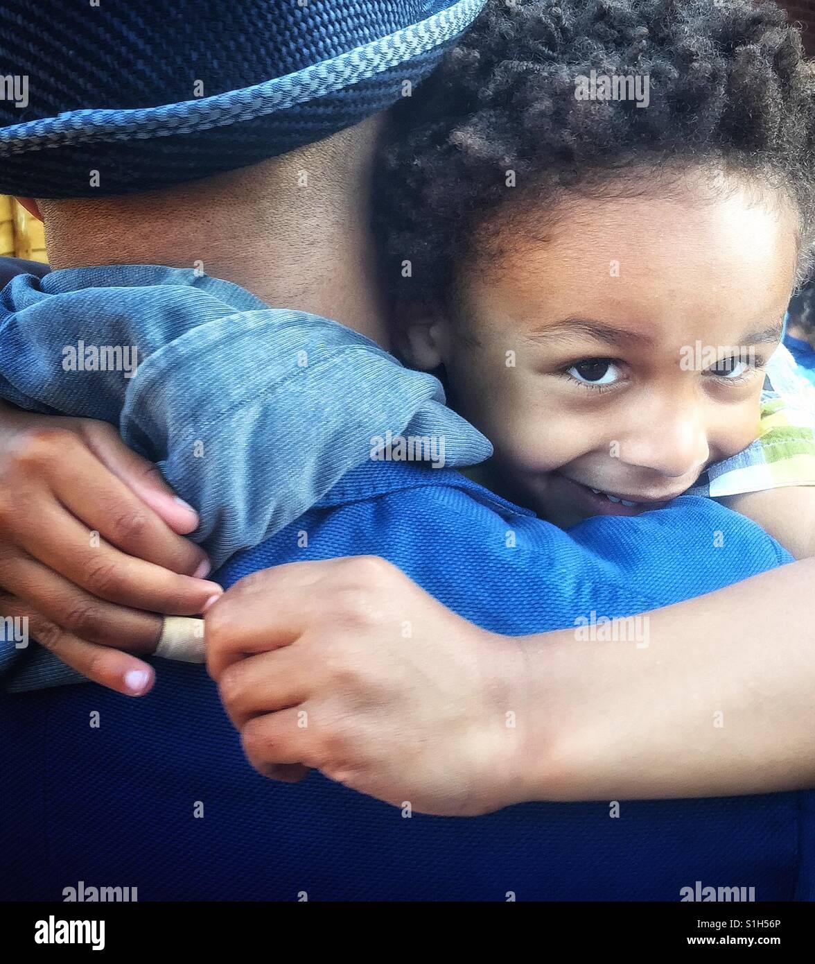 Boy hug hi-res stock photography and images - Alamy