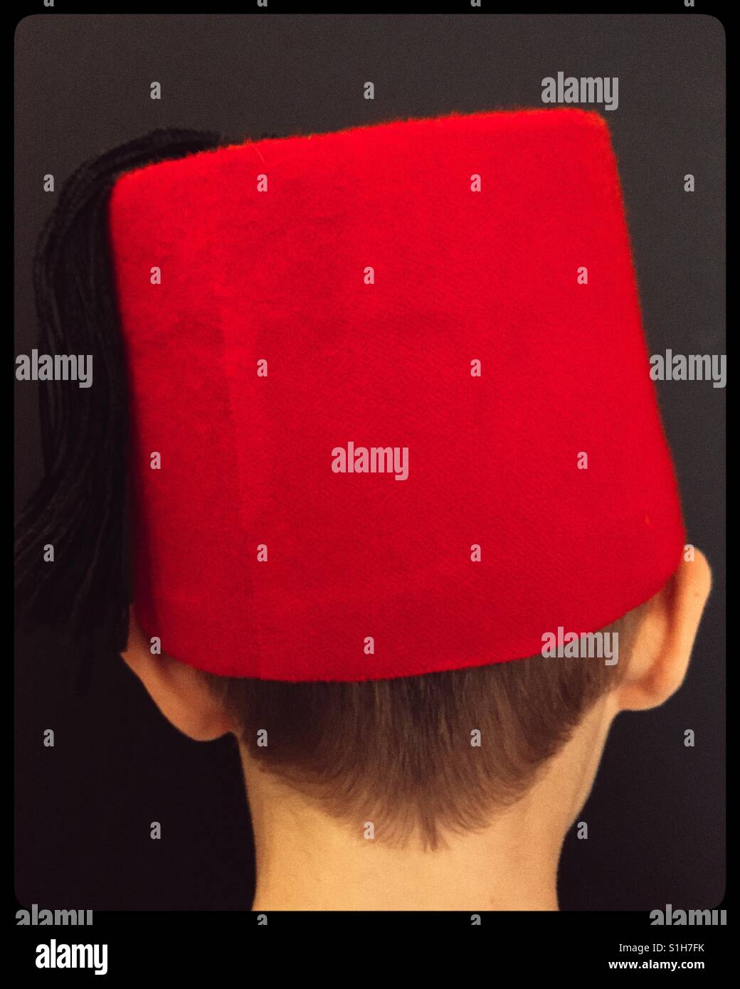 Boy wearing a Fez Stock Photo - Alamy
