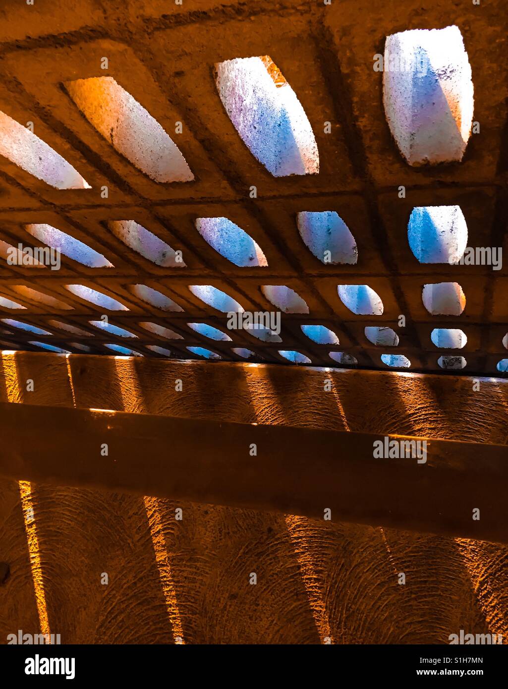 Shadows from colorful decorative concrete wall blocks Stock Photo - Alamy