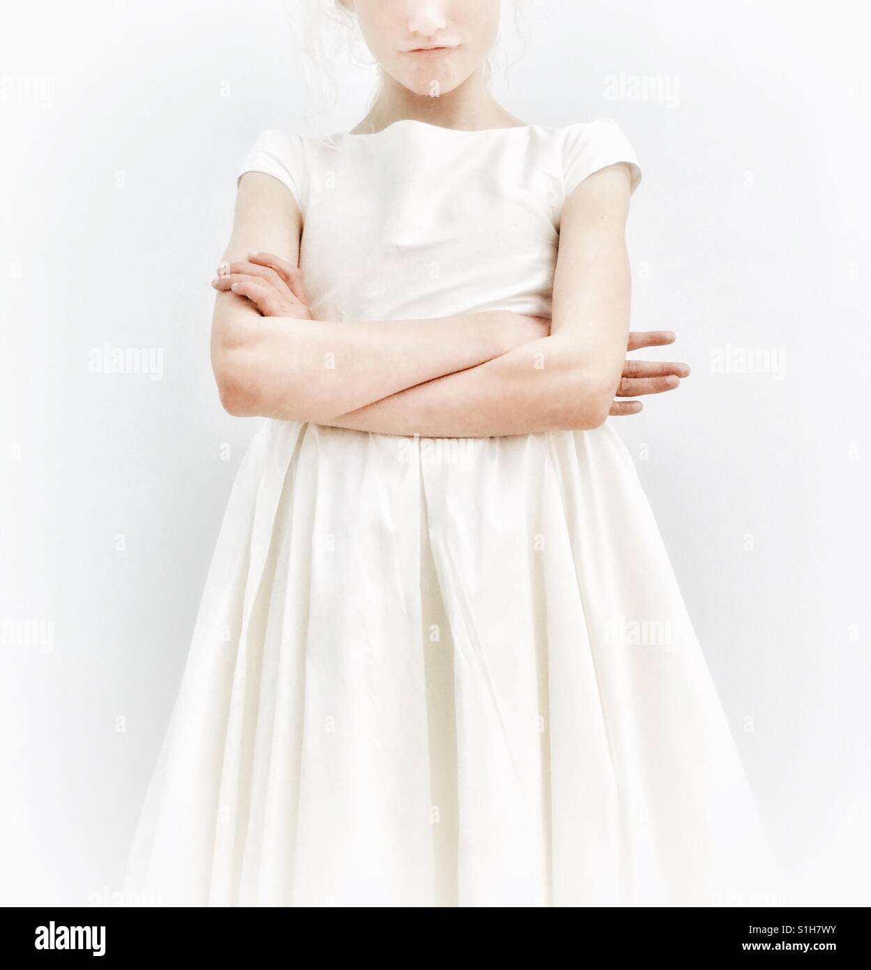 Stubborn pouting bridesmaid with folded arms Stock Photo - Alamy