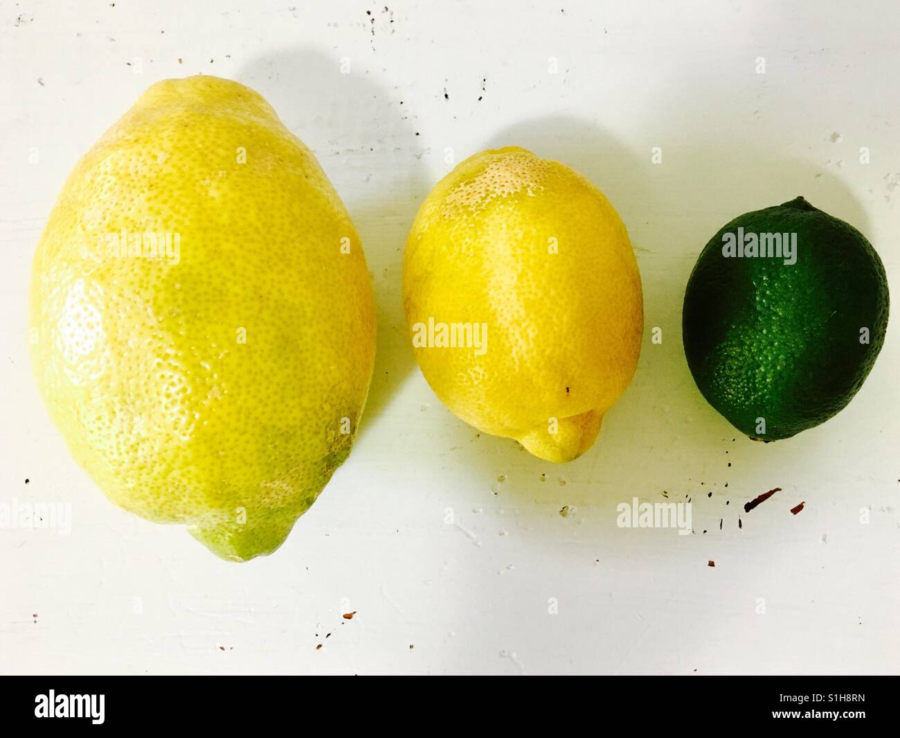 Lemons and lime Stock Photo - Alamy