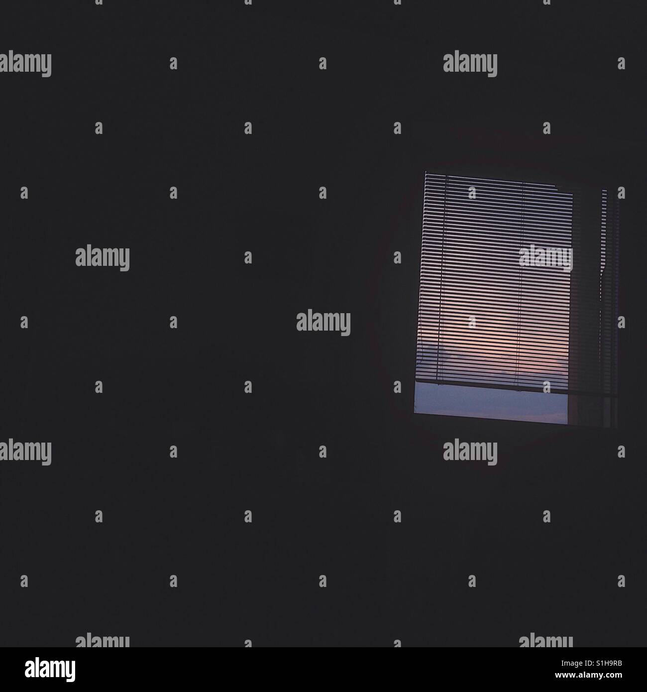 Staring at the window in the dark Stock Photo - Alamy