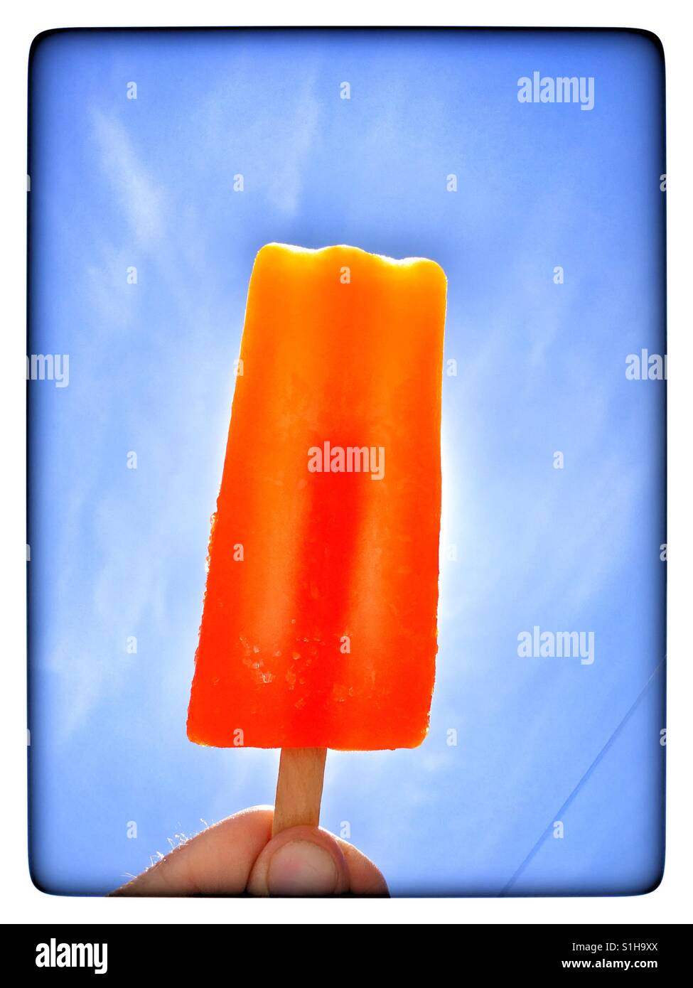 Orange ice lolly hi-res stock photography and images - Alamy