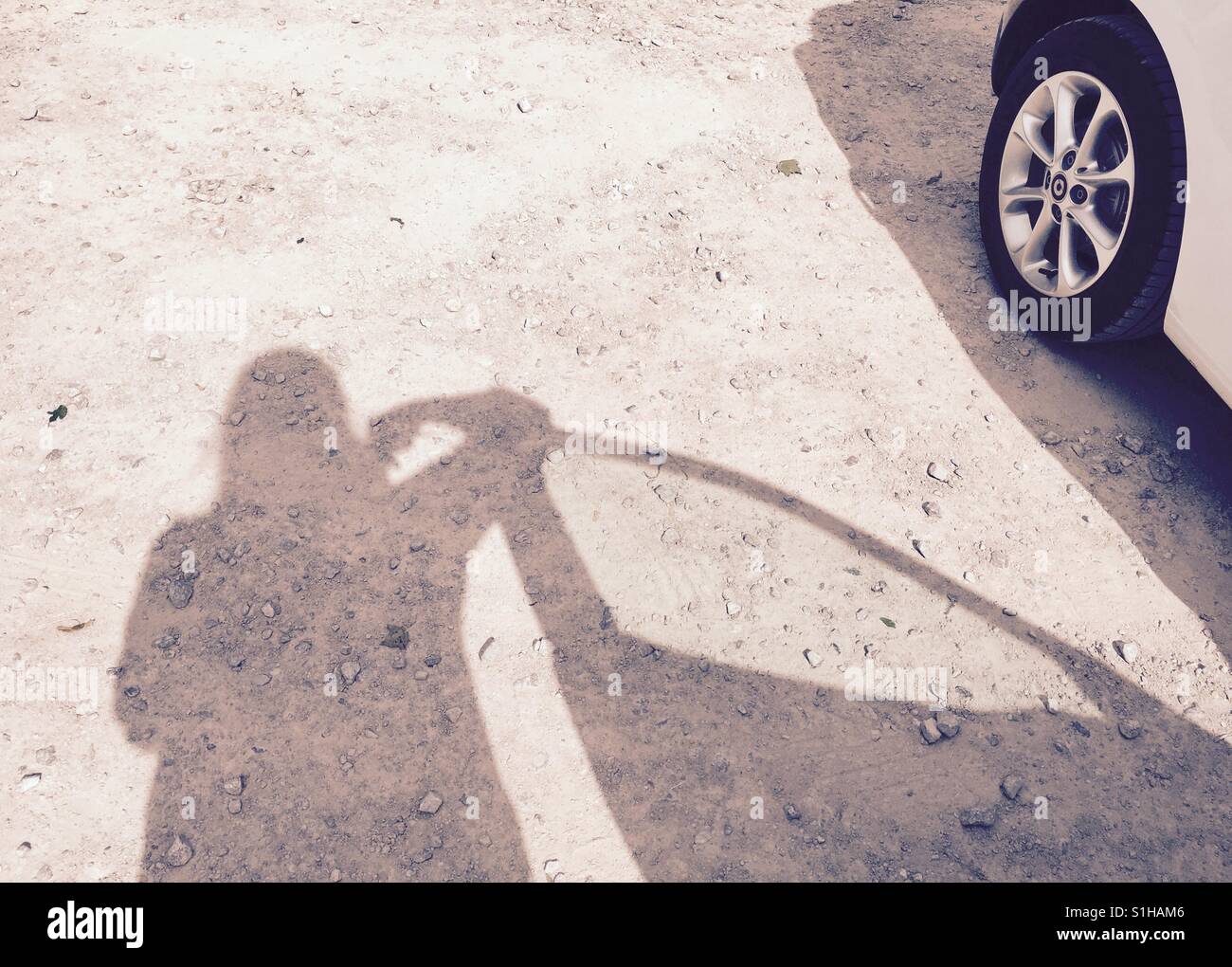 Selfie shadow with a car Stock Photo - Alamy