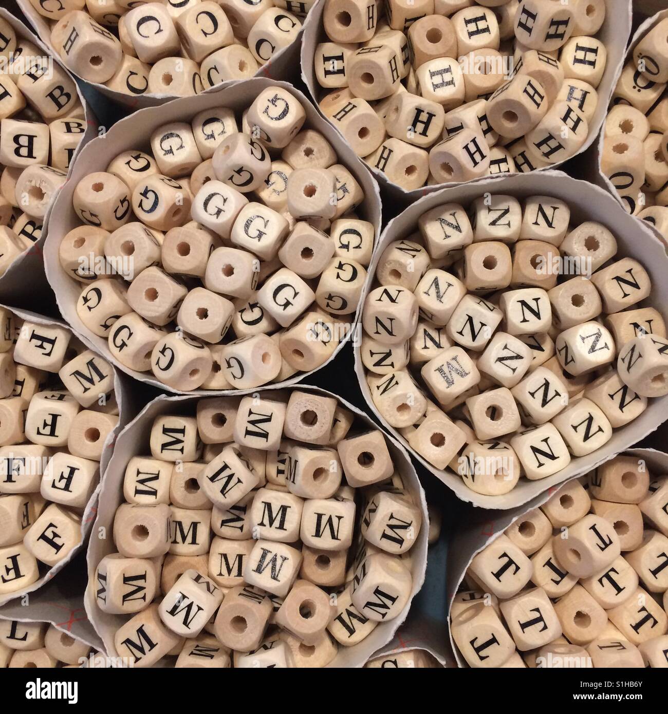 Letters on beads Stock Photo - Alamy