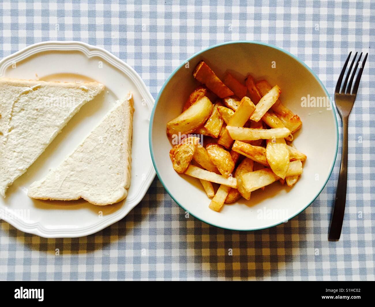 New potato chips and bread and butter Stock Photo - Alamy