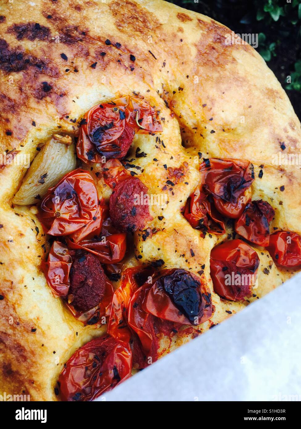 Italian focaccia wrapped in white paper Stock Photo - Alamy
