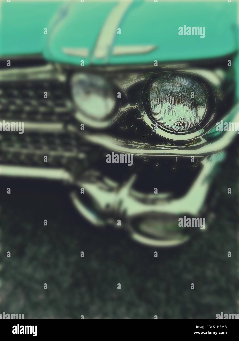 Classic car headlights and chrome blur Stock Photo - Alamy