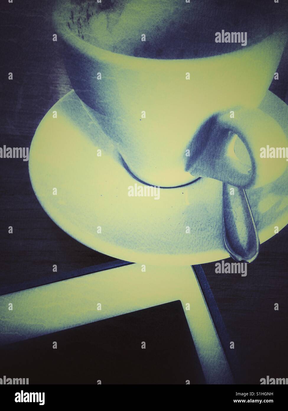 Coffee cup and tablet Stock Photo - Alamy
