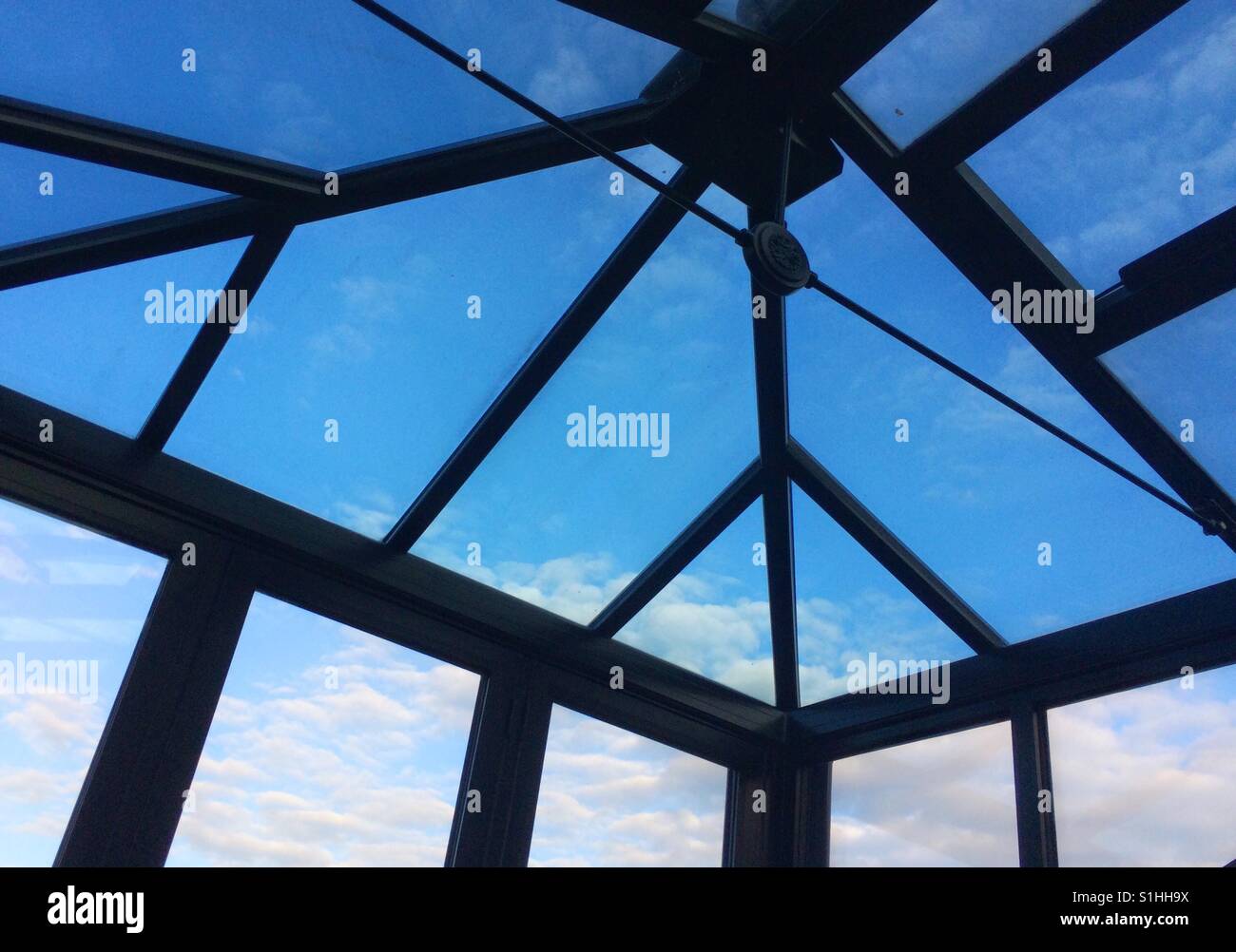 Blue sky roof hi-res stock photography and images - Alamy