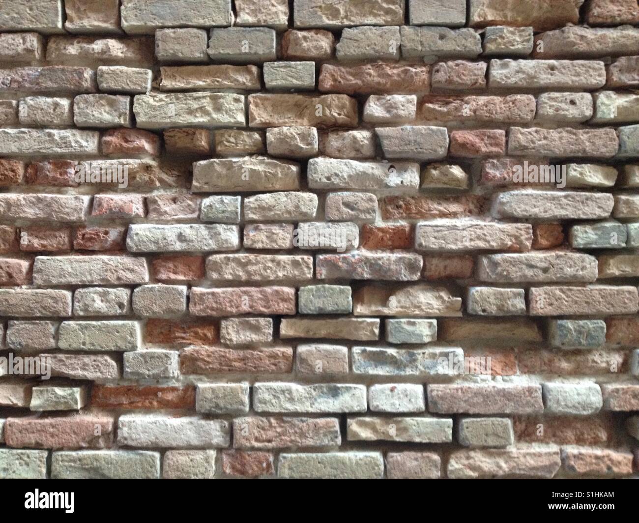 Stones in brick wall hi-res stock photography and images - Alamy