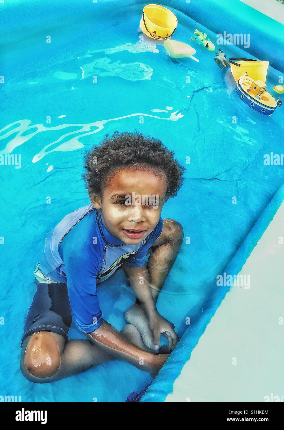 Kid paddling hi-res stock photography and images - Alamy