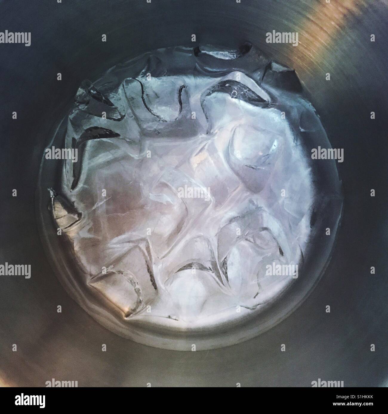 Ice cube melting smartphone stock photos and images - Alamy