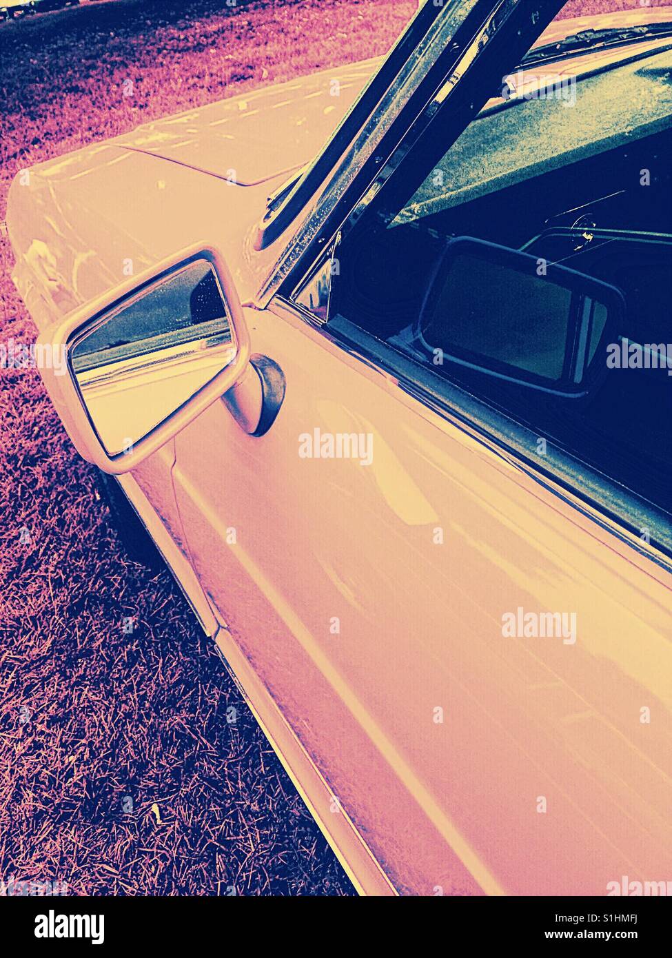 Pink Classic car wing mirror Stock Photo - Alamy