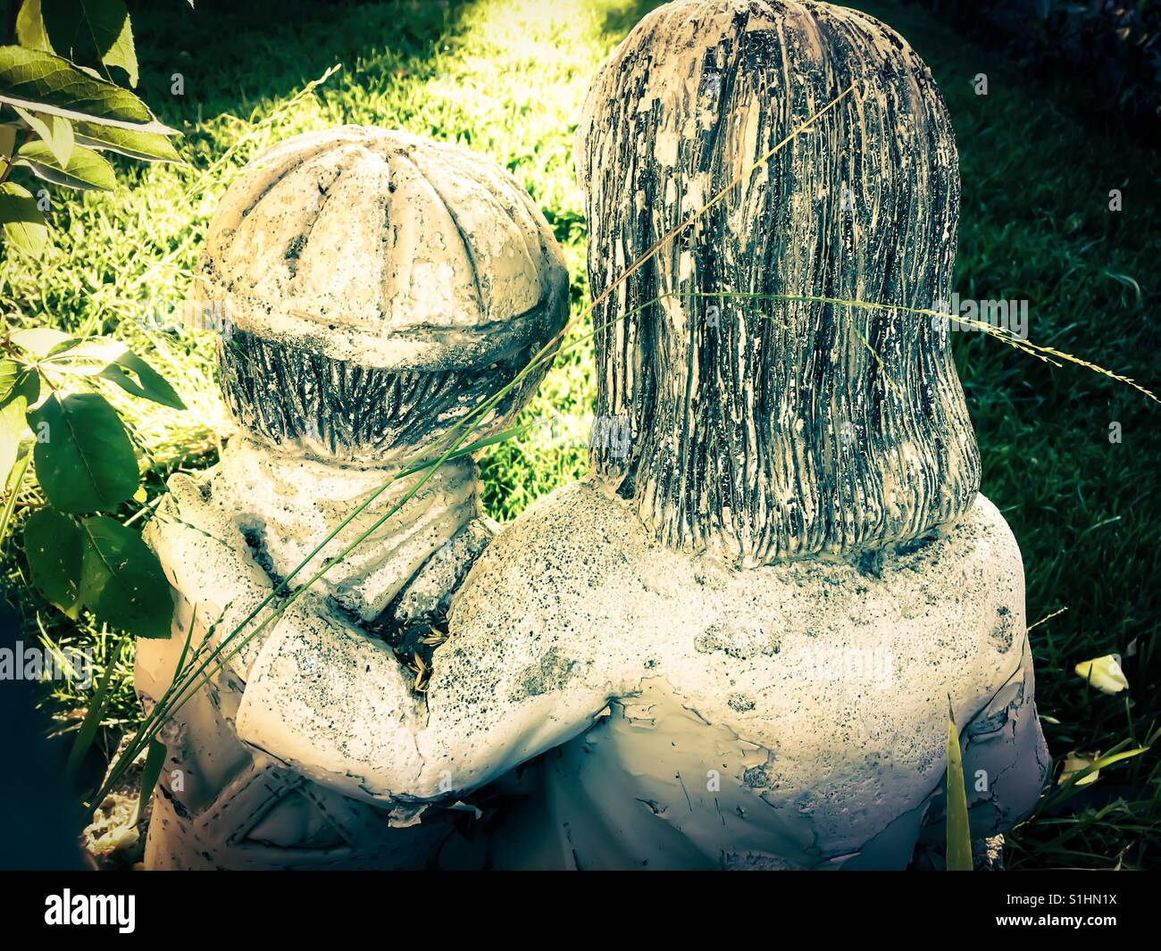 Friendship and guidance statue of children Stock Photo - Alamy