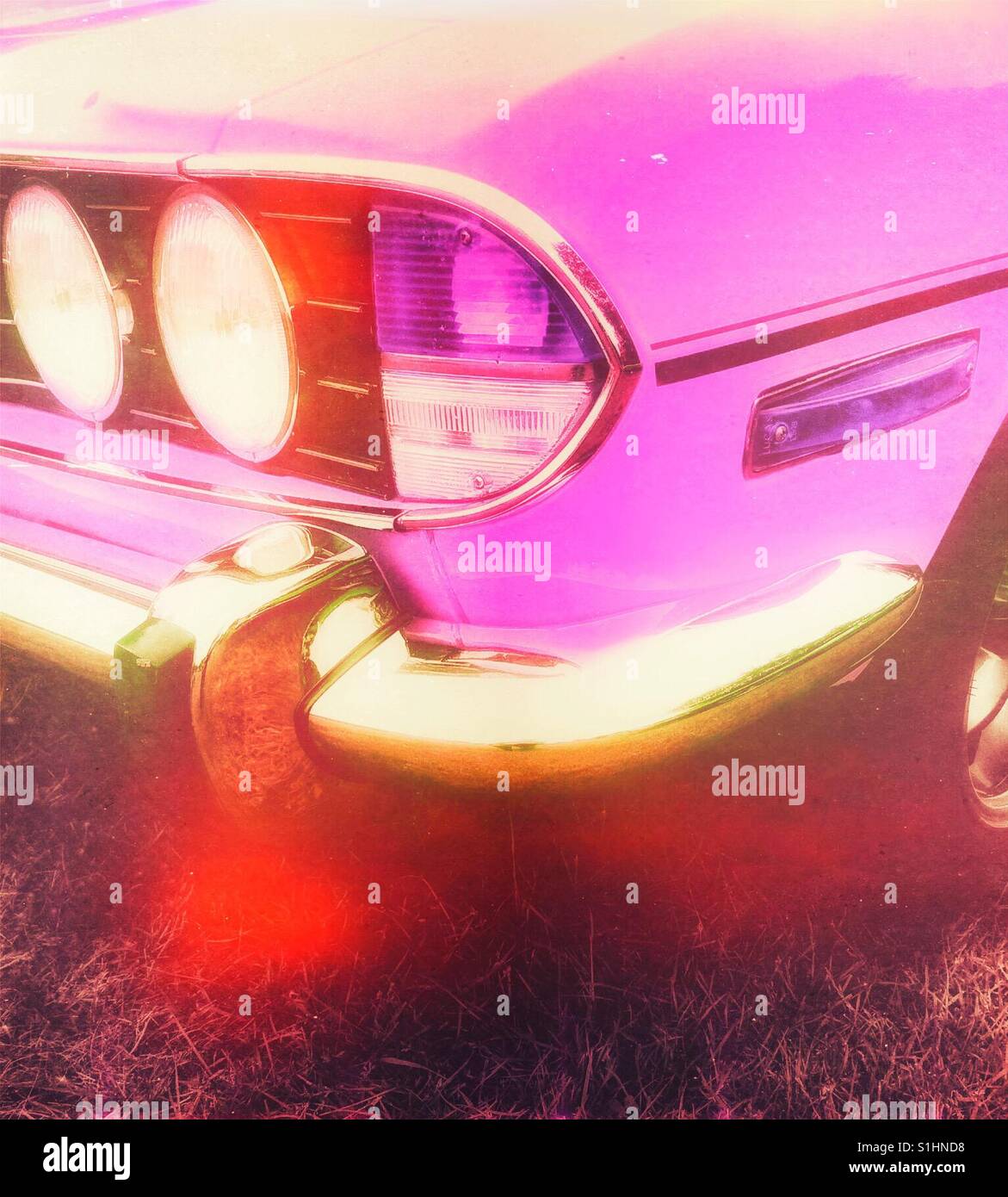 Pink classic car bumper and headlights Stock Photo - Alamy