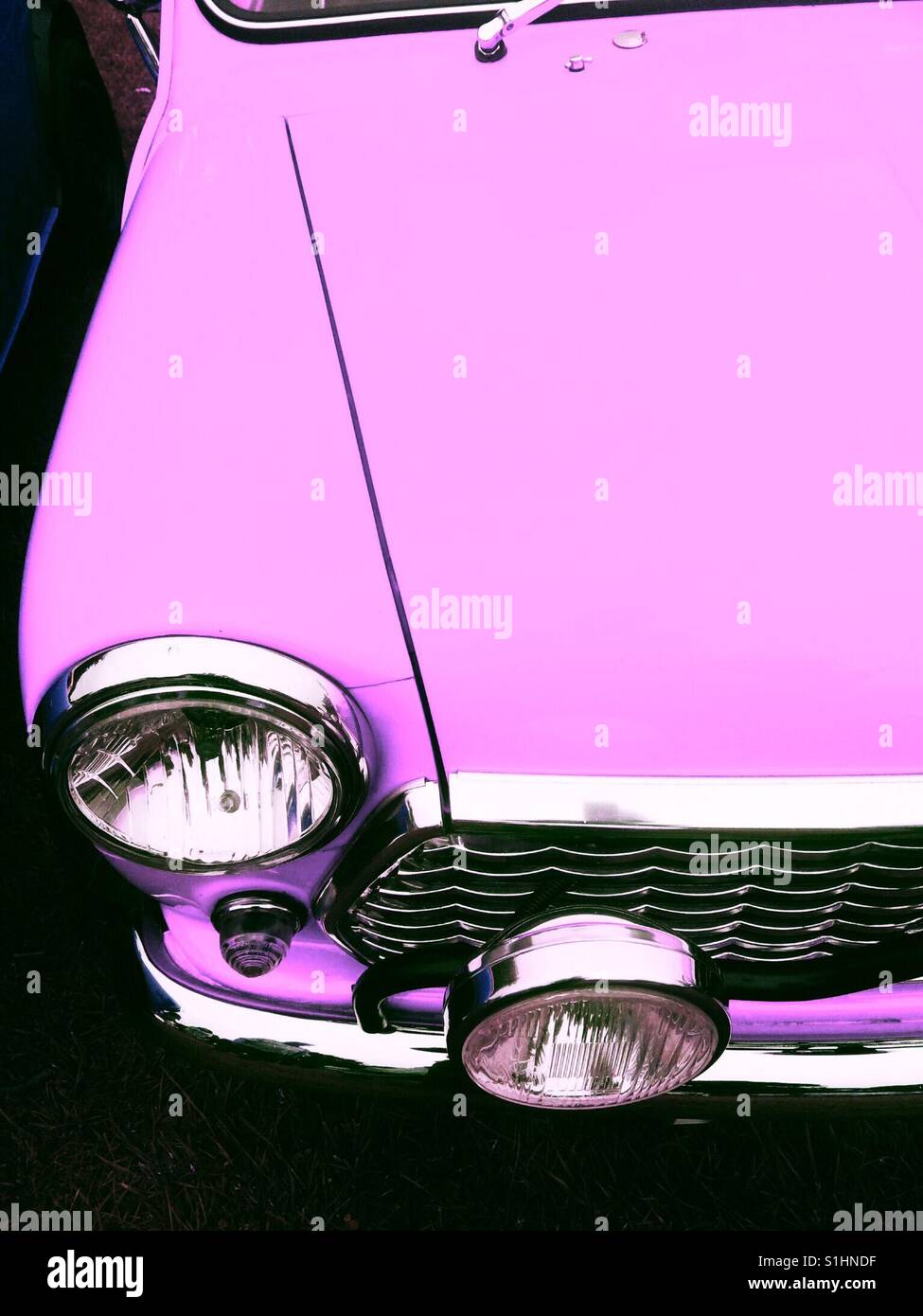 Pink classic car bonnet hood grille radiator round headlights Stock ...