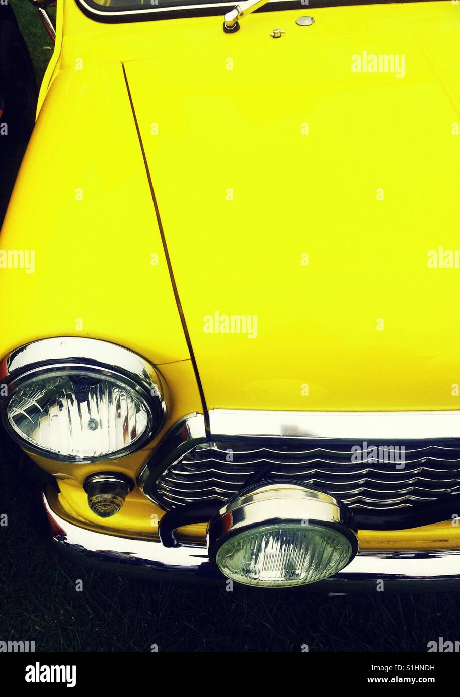Yellow classic car bonnet hood grille radiator round headlights Stock ...