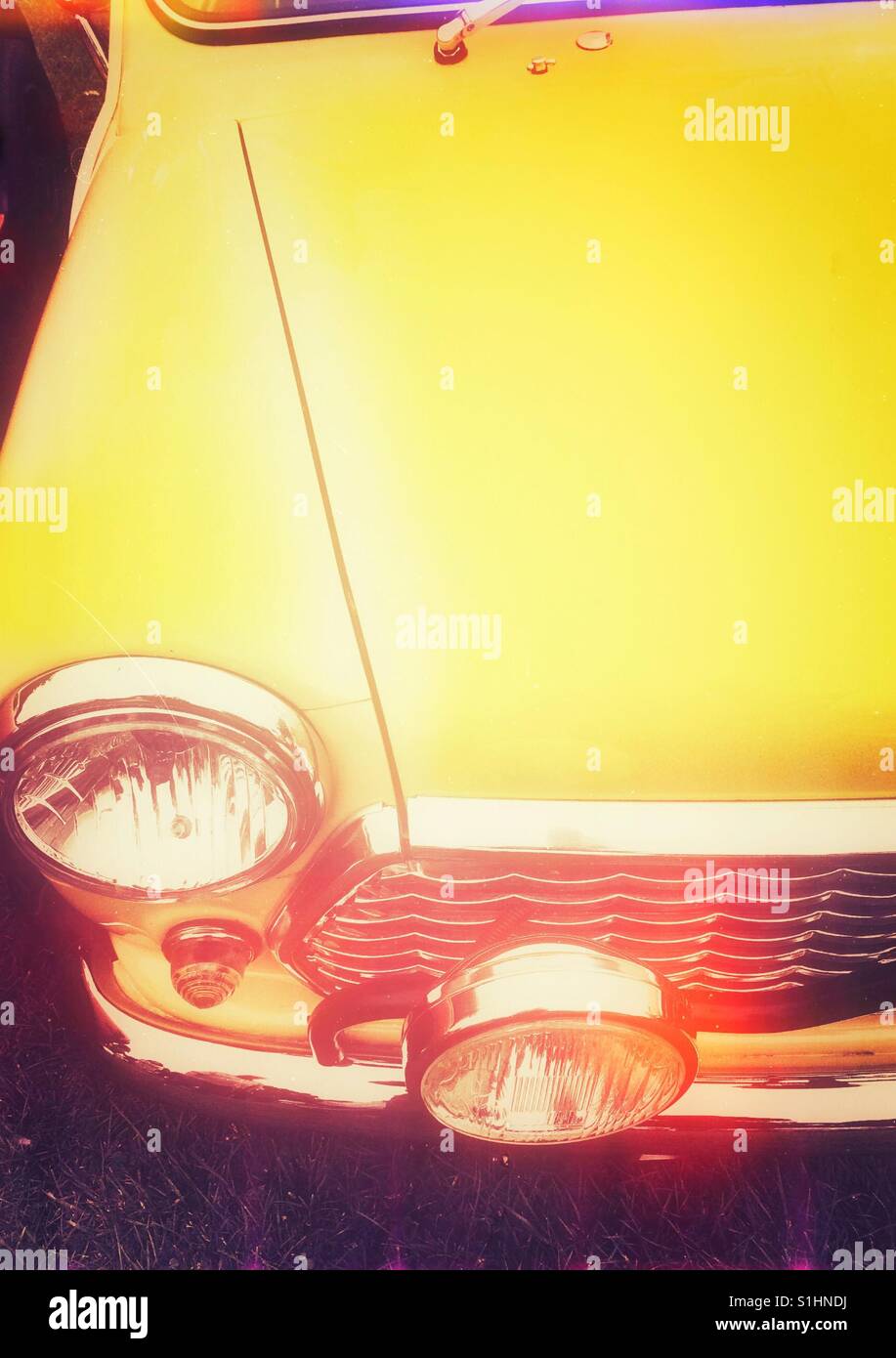 Yellow classic car bonnet hood grille radiator round headlights Stock ...