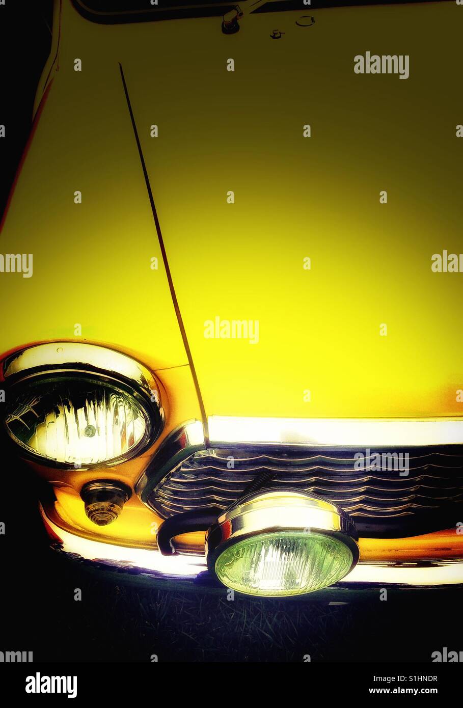 Yellow classic car bonnet hood grille radiator round headlights Stock ...