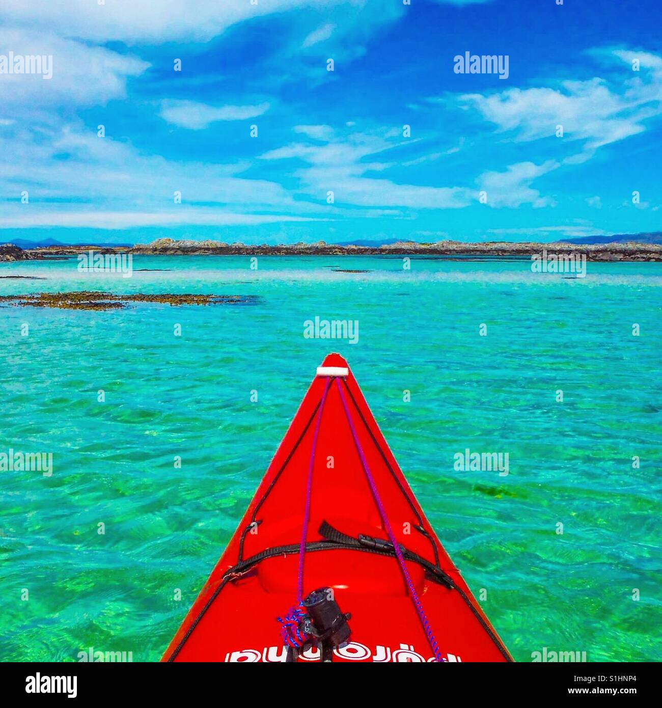 Sea Kayaking in the beautiful turquoise seas of the Sound of Arisaig on ...