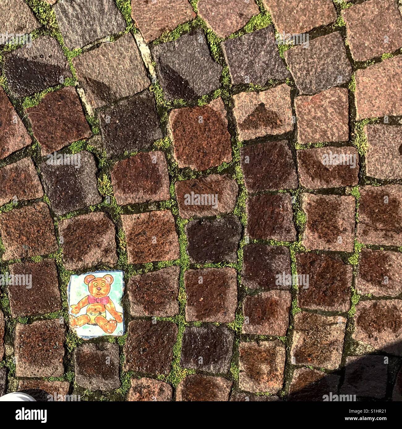 Teddy bear on a cobalt street Stock Photo - Alamy