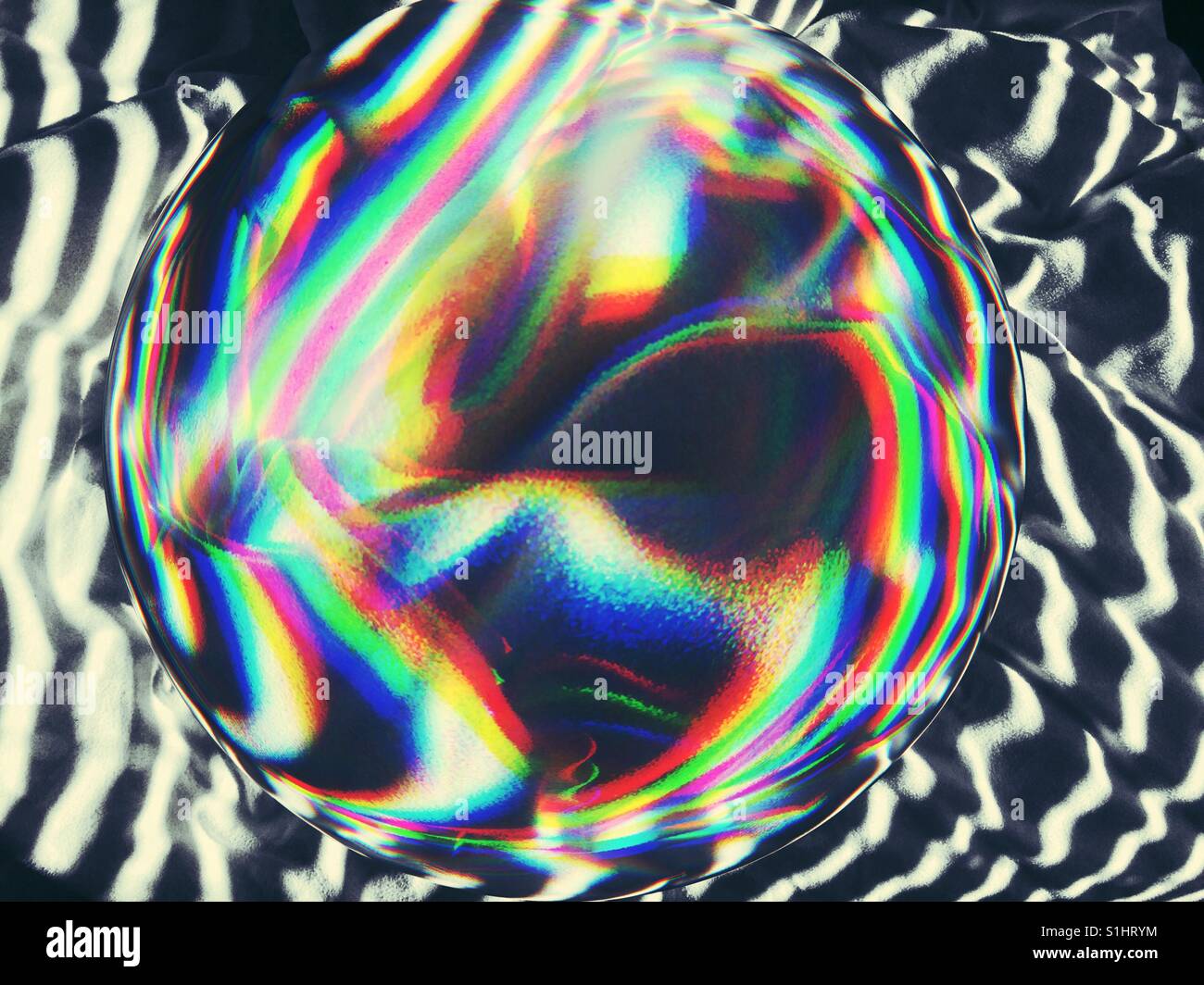 Abstract spherical rainbow design representing universe Stock Photo - Alamy