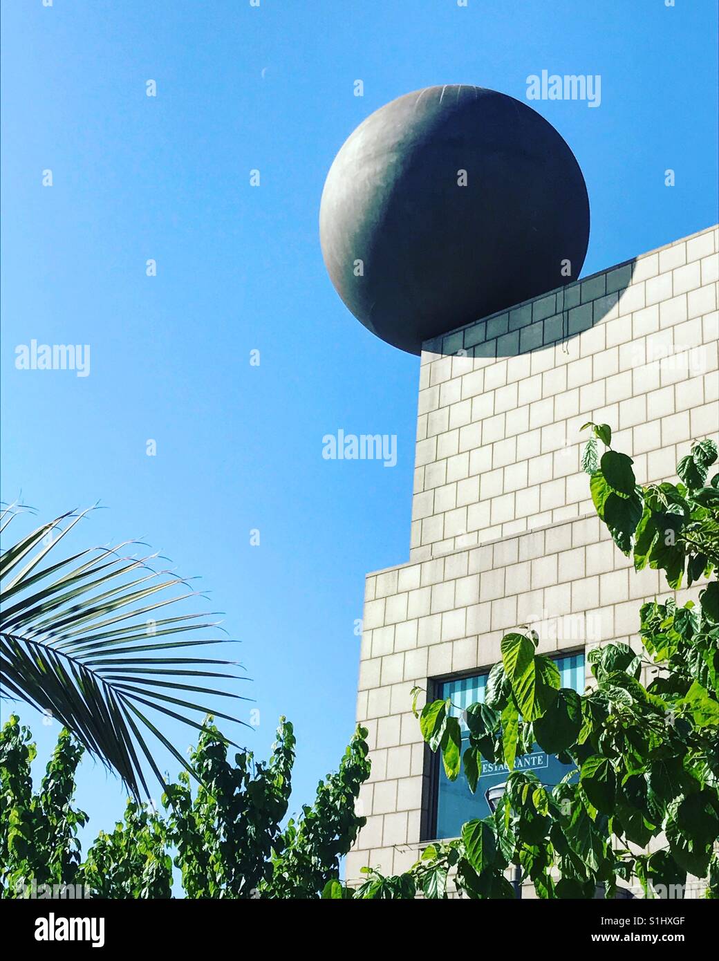 Ball on a building Stock Photo - Alamy