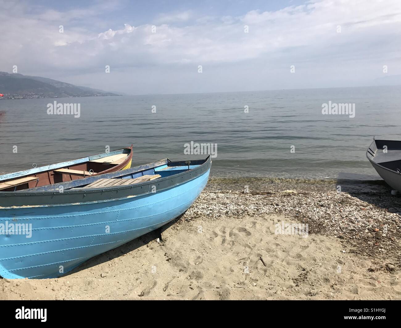 Boats on the beach, Orhid lake, Pogradec, Albania Stock Photo - Alamy